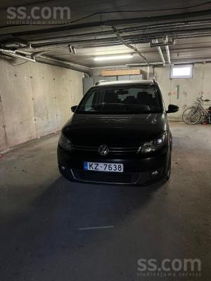 Black Volkswagen Touran 2013 in Riga, with an engine capacity of 2.00 L and mileage of 321 thousand km for 6499 €, photo  on AUTOMOTO.COM.LV
