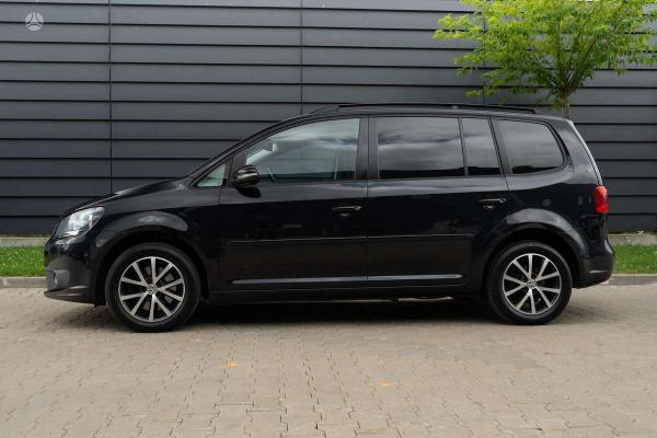 Black Volkswagen Touran 2013 in Vilnius, with an engine capacity of 1.39 L and mileage of 219 thousand km for 6600 €, photo 2 on AUTOMOTO.COM.LV