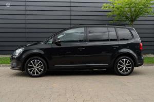 Black Volkswagen Touran 2013 in Vilnius, with an engine capacity of 1.39 L and mileage of 219 thousand km for 6600 €, photo 3 on AUTOMOTO.COM.LV