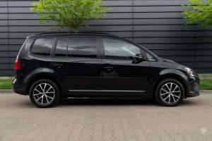 Black Volkswagen Touran 2013 in Vilnius, with an engine capacity of 1.39 L and mileage of 219 thousand km for 6600 €, photo 7 on AUTOMOTO.COM.LV