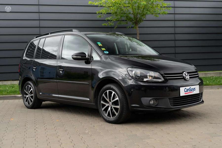 Black Volkswagen Touran 2013 in Vilnius, with an engine capacity of 1.39 L and mileage of 219 thousand km for 6600 €, photo 8 on AUTOMOTO.COM.LV