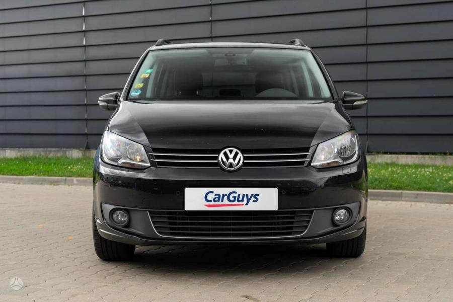 Black Volkswagen Touran 2013 in Vilnius, with an engine capacity of 1.39 L and mileage of 219 thousand km for 6600 €, photo 9 on AUTOMOTO.COM.LV