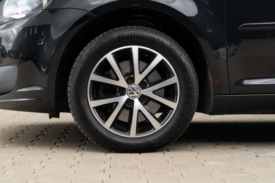 Black Volkswagen Touran 2013 in Vilnius, with an engine capacity of 1.39 L and mileage of 219 thousand km for 6600 €, photo 12 on AUTOMOTO.COM.LV