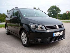 Black Volkswagen Touran 2013 in Cesis, with an engine capacity of 1.60 L and mileage of 0 thousand km for 7200 €, photo 3 on AUTOMOTO.COM.LV