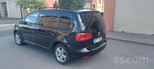 Black Volkswagen Touran 2013 in Riga, with an engine capacity of 2.00 L and mileage of 352 thousand km for 5300 €, photo  on AUTOMOTO.COM.LV