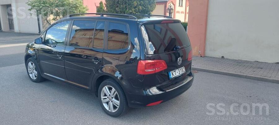 Black Volkswagen Touran 2013 in Riga, with an engine capacity of 2.00 L and mileage of 352 thousand km for 5300 €, photo 1 on AUTOMOTO.COM.LV