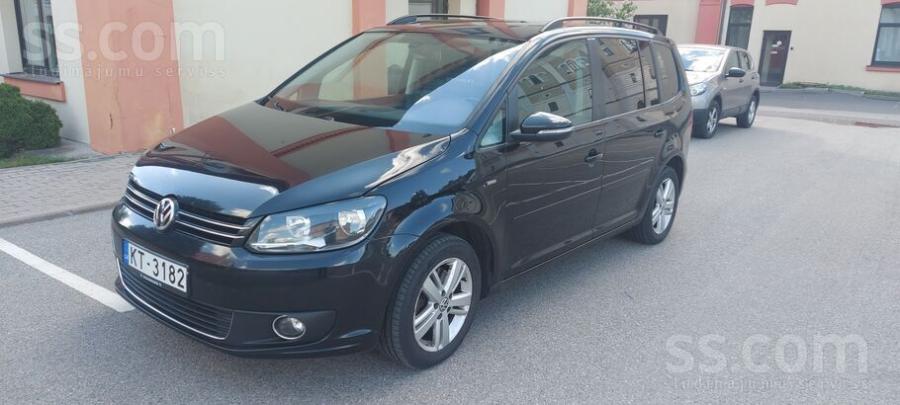 Black Volkswagen Touran 2013 in Riga, with an engine capacity of 2.00 L and mileage of 352 thousand km for 5300 €, photo 3 on AUTOMOTO.COM.LV