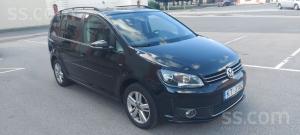 Black Volkswagen Touran 2013 in Riga, with an engine capacity of 2.00 L and mileage of 352 thousand km for 5300 €, photo 5 on AUTOMOTO.COM.LV