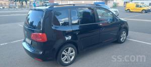 Black Volkswagen Touran 2013 in Riga, with an engine capacity of 2.00 L and mileage of 352 thousand km for 5300 €, photo 6 on AUTOMOTO.COM.LV