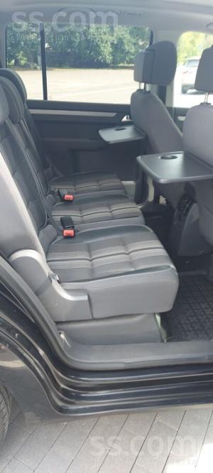 Black Volkswagen Touran 2013 in Riga, with an engine capacity of 2.00 L and mileage of 352 thousand km for 5300 €, photo 8 on AUTOMOTO.COM.LV