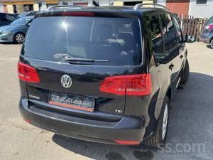 Black Volkswagen Touran 2013 in Riga, with an engine capacity of 1.40 L and mileage of 225 thousand km for 7850 €, photo 3 on AUTOMOTO.COM.LV