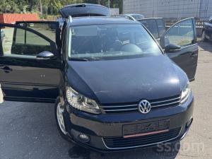 Black Volkswagen Touran 2013 in Riga, with an engine capacity of 1.40 L and mileage of 225 thousand km for 7850 €, photo 5 on AUTOMOTO.COM.LV