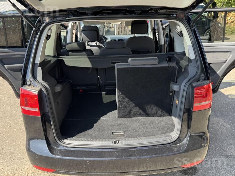 Black Volkswagen Touran 2013 in Riga, with an engine capacity of 1.40 L and mileage of 225 thousand km for 7850 €, photo 6 on AUTOMOTO.COM.LV