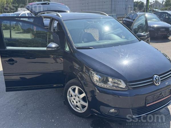 Black Volkswagen Touran 2013 in Riga, with an engine capacity of 1.40 L and mileage of 225 thousand km for 7850 €, photo 6 on AUTOMOTO.COM.LV