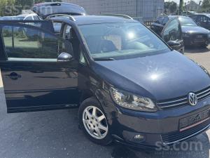 Black Volkswagen Touran 2013 in Riga, with an engine capacity of 1.40 L and mileage of 225 thousand km for 7850 €, photo 7 on AUTOMOTO.COM.LV