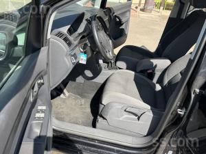 Black Volkswagen Touran 2013 in Riga, with an engine capacity of 1.40 L and mileage of 225 thousand km for 7850 €, photo 9 on AUTOMOTO.COM.LV