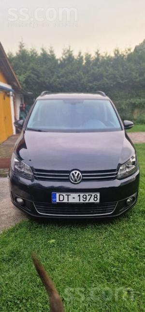 Melns Volkswagen Touran 2013 Rīga, ar dzinēja tilpumu 2.00 L un nobraukumu 322 tūkst. km par 5000 €, foto 3 vietnē AUTOMOTO.COM.LV