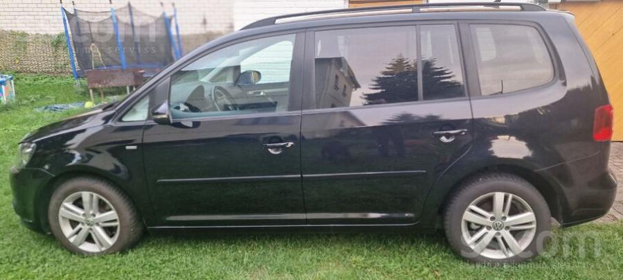 Melns Volkswagen Touran 2013 Rīga, ar dzinēja tilpumu 2.00 L un nobraukumu 322 tūkst. km par 5000 €, foto 4 vietnē AUTOMOTO.COM.LV