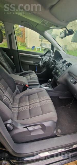 Melns Volkswagen Touran 2013 Rīga, ar dzinēja tilpumu 2.00 L un nobraukumu 322 tūkst. km par 5000 €, foto 8 vietnē AUTOMOTO.COM.LV
