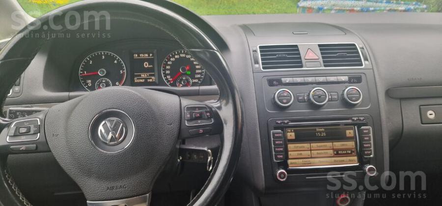 Melns Volkswagen Touran 2013 Rīga, ar dzinēja tilpumu 2.00 L un nobraukumu 322 tūkst. km par 5000 €, foto 12 vietnē AUTOMOTO.COM.LV