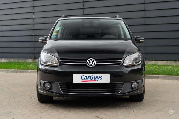 Black Volkswagen Touran 2013 in Vilnius, with an engine capacity of 1.39 L and mileage of 219 thousand km for 5850 €, photo 3 on AUTOMOTO.COM.LV