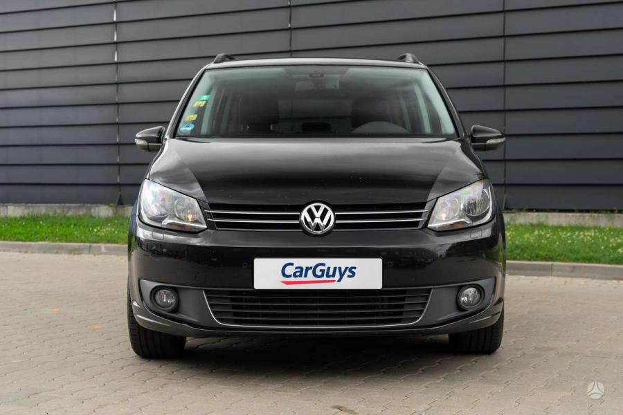 Black Volkswagen Touran 2013 in Vilnius, with an engine capacity of 1.39 L and mileage of 219 thousand km for 5850 €, photo 3 on AUTOMOTO.COM.LV