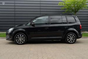Black Volkswagen Touran 2013 in Vilnius, with an engine capacity of 1.39 L and mileage of 219 thousand km for 5850 €, photo 5 on AUTOMOTO.COM.LV