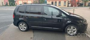 Melns Volkswagen Touran 2013 Rīga, ar dzinēja tilpumu 2.00 L un nobraukumu 353 tūkst. km par 3900 €, foto 4 vietnē AUTOMOTO.COM.LV