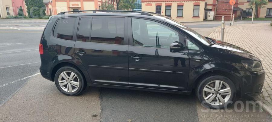 Melns Volkswagen Touran 2013 Rīga, ar dzinēja tilpumu 2.00 L un nobraukumu 353 tūkst. km par 3900 €, foto 4 vietnē AUTOMOTO.COM.LV