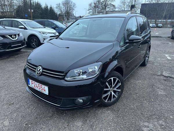 Melns Volkswagen Touran 2014 Alīta, ar dzinēja tilpumu 1.60 L un nobraukumu 277 tūkst. km par 7700 €, foto 2 vietnē AUTOMOTO.COM.LV