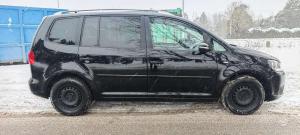 Black Volkswagen Touran 2014 in Utena, with an engine capacity of 1.60 L and mileage of 202 thousand km for 4950 €, photo 6 on AUTOMOTO.COM.LV