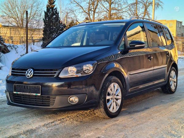 Black Volkswagen Touran 2014 in Kaunas, with an engine capacity of 1.97 L and mileage of 290 thousand km for 6650 €, photo 2 on AUTOMOTO.COM.LV