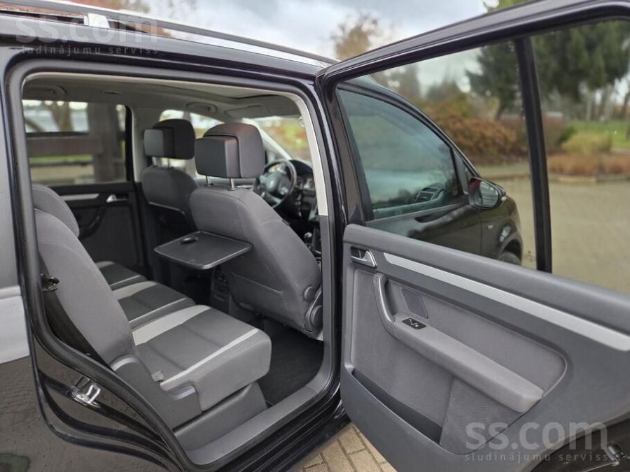 Black Volkswagen Touran 2014 in Ogre, with an engine capacity of 1.60 L and mileage of 365 thousand km for 8700 €, photo 5 on AUTOMOTO.COM.LV
