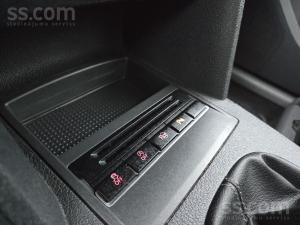 Black Volkswagen Touran 2014 in Ogre, with an engine capacity of 1.60 L and mileage of 365 thousand km for 8700 €, photo 12 on AUTOMOTO.COM.LV