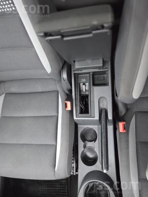 Black Volkswagen Touran 2014 in Ogre, with an engine capacity of 1.60 L and mileage of 365 thousand km for 8700 €, photo 16 on AUTOMOTO.COM.LV