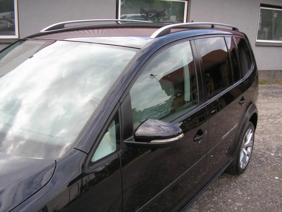 Melns Volkswagen Touran 2014 Sigulda, ar dzinēja tilpumu 2.00 L un nobraukumu 263 tūkst. km par 7750 €, foto 14 vietnē AUTOMOTO.COM.LV