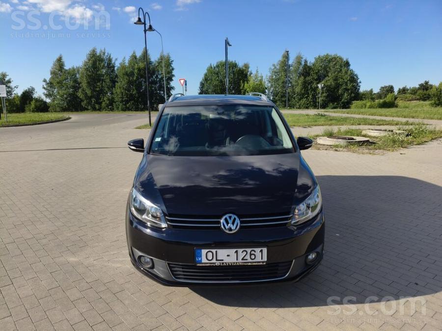 Melns Volkswagen Touran 2014 Daugavpils, ar dzinēja tilpumu 1.60 L un nobraukumu 226 tūkst. km par 6750 €, foto 5 vietnē AUTOMOTO.COM.LV