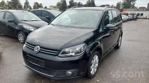 Black Volkswagen Touran 2014 in Riga, with an engine capacity of 1.20 L and mileage of 220 thousand km for 6500 €, photo 4 on AUTOMOTO.COM.LV