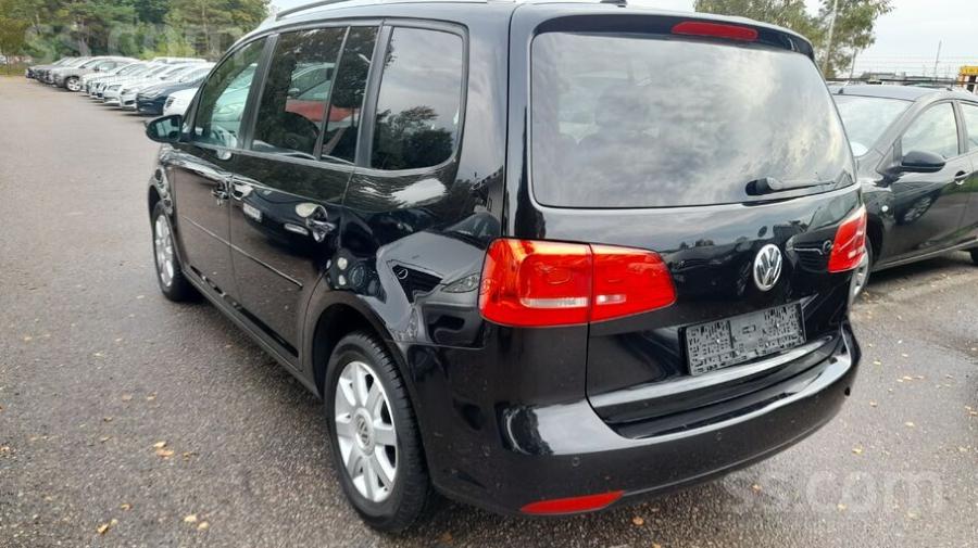 Black Volkswagen Touran 2014 in Riga, with an engine capacity of 1.20 L and mileage of 220 thousand km for 6500 €, photo 5 on AUTOMOTO.COM.LV