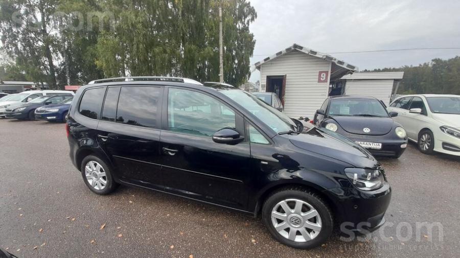 Black Volkswagen Touran 2014 in Riga, with an engine capacity of 1.20 L and mileage of 220 thousand km for 6500 €, photo 11 on AUTOMOTO.COM.LV