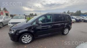 Black Volkswagen Touran 2014 in Riga, with an engine capacity of 1.20 L and mileage of 220 thousand km for 6500 €, photo 12 on AUTOMOTO.COM.LV