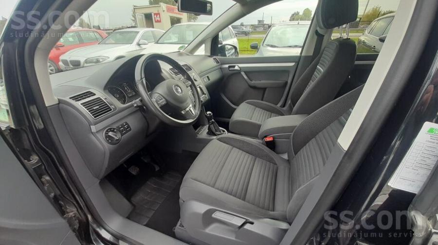 Black Volkswagen Touran 2014 in Riga, with an engine capacity of 1.20 L and mileage of 220 thousand km for 6500 €, photo 13 on AUTOMOTO.COM.LV