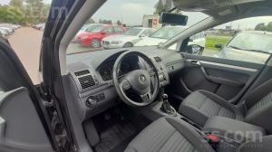 Black Volkswagen Touran 2014 in Riga, with an engine capacity of 1.20 L and mileage of 220 thousand km for 6500 €, photo 14 on AUTOMOTO.COM.LV