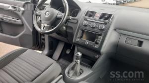 Black Volkswagen Touran 2014 in Riga, with an engine capacity of 1.20 L and mileage of 220 thousand km for 6500 €, photo 22 on AUTOMOTO.COM.LV