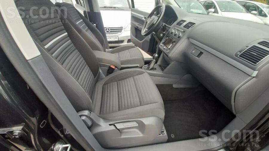 Black Volkswagen Touran 2014 in Riga, with an engine capacity of 1.20 L and mileage of 220 thousand km for 6500 €, photo 23 on AUTOMOTO.COM.LV