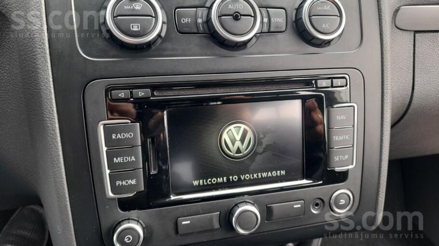 Black Volkswagen Touran 2014 in Riga, with an engine capacity of 1.20 L and mileage of 220 thousand km for 6500 €, photo 26 on AUTOMOTO.COM.LV