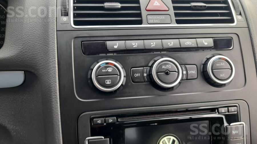 Black Volkswagen Touran 2014 in Riga, with an engine capacity of 1.20 L and mileage of 220 thousand km for 6500 €, photo 27 on AUTOMOTO.COM.LV