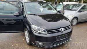 Black Volkswagen Touran 2014 in Riga, with an engine capacity of 1.20 L and mileage of 220 thousand km for 6500 €, photo 30 on AUTOMOTO.COM.LV