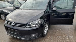 Black Volkswagen Touran 2014 in Riga, with an engine capacity of 1.20 L and mileage of 220 thousand km for 6500 €, photo 31 on AUTOMOTO.COM.LV