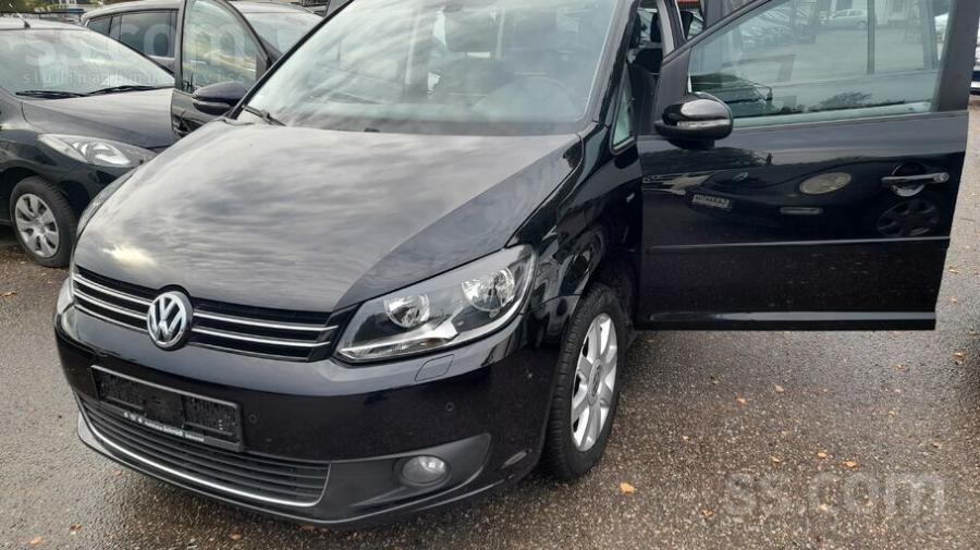 Black Volkswagen Touran 2014 in Riga, with an engine capacity of 1.20 L and mileage of 220 thousand km for 6500 €, photo 31 on AUTOMOTO.COM.LV